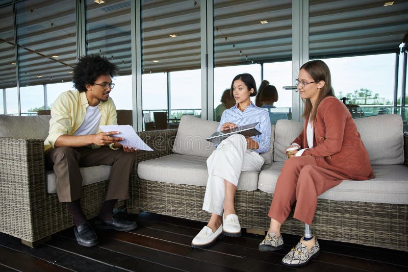 Three Colleagues Chat and Laugh Together Stock Image - Image of brown ...