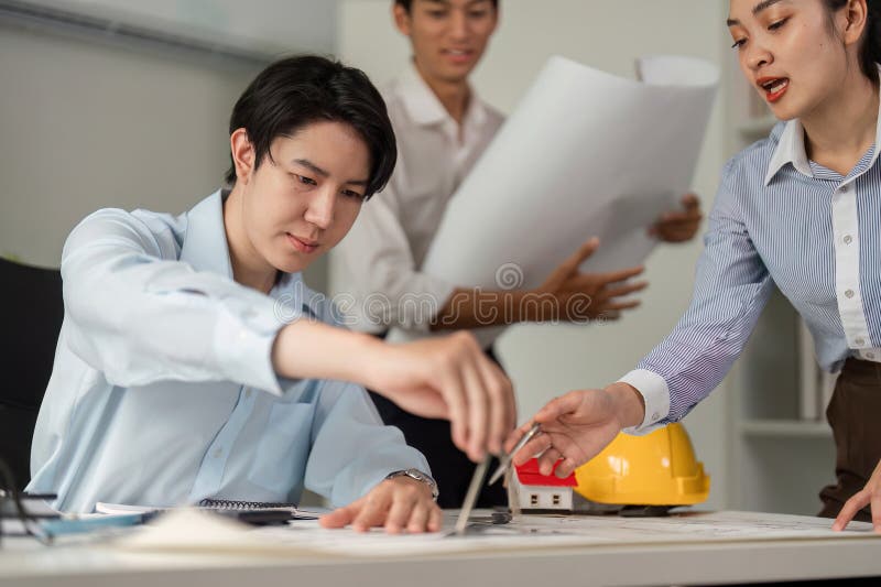 Team Collaboration and Planning. Professionals Devising a Construction ...