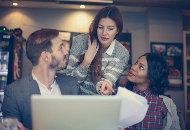 Three Colleagues Working Together. Stock Photo - Image of coworker ...