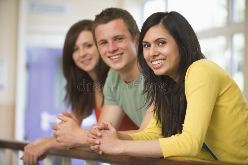 Three College Students Leaning on Banister Stock Image - Image of adult ...