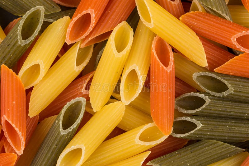 Three color penne pasta stock image. Image of uncooked - 64836125
