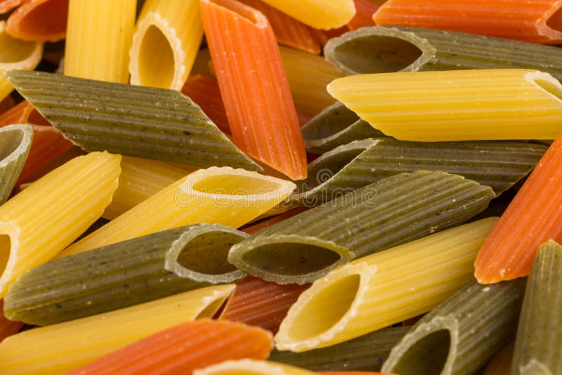 Three color penne pasta stock photo. Image of closeup - 60671472