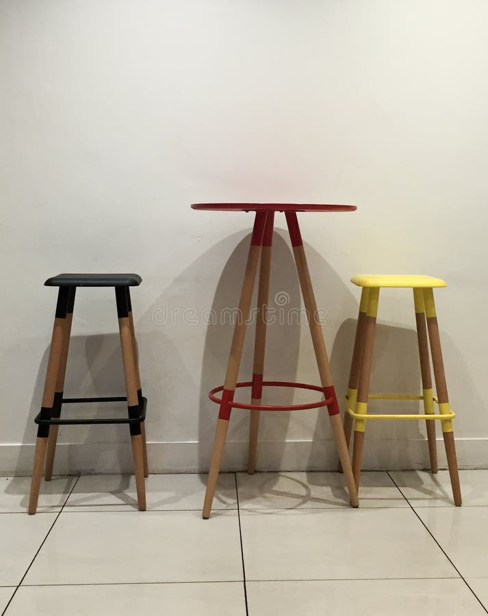 Three colored bar stools stock image. Image of blue, furniture - 99284075