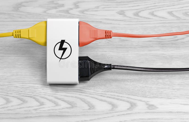 Three Colored Cables Connected To a Multiple Socket Stock Photo - Image ...