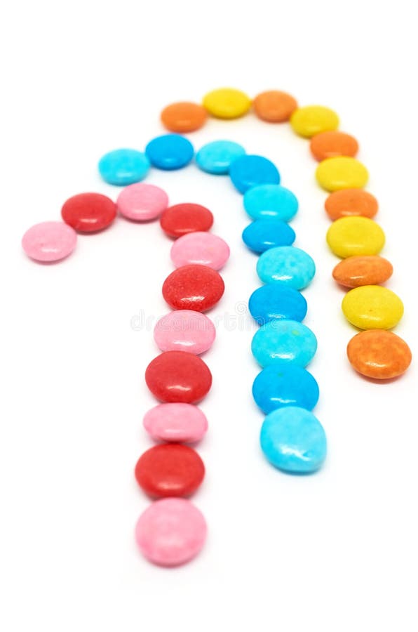 Three Colored Candies Isolated on White Background Vertical Format ...