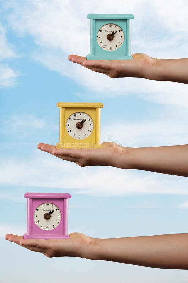 Three Colored Clocks stock image. Image of time, female - 25991677