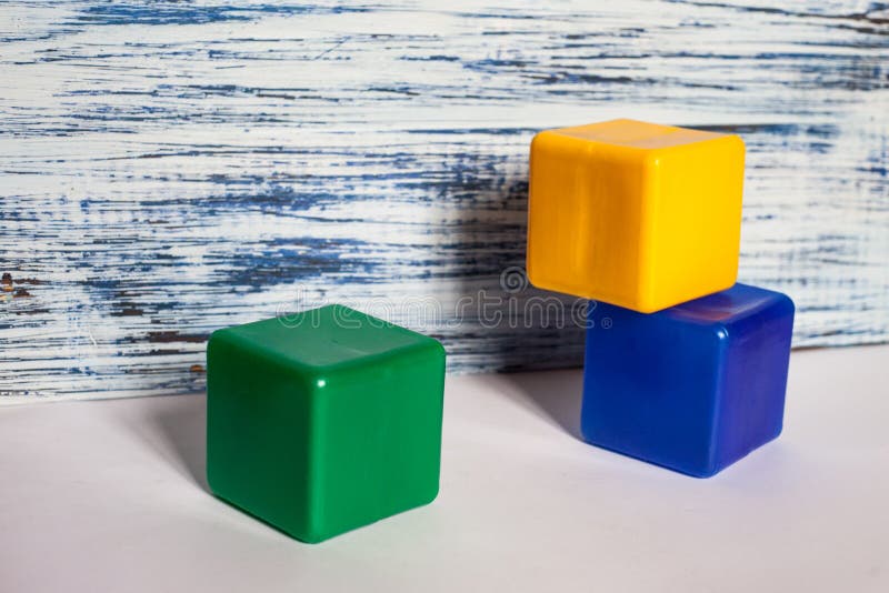 Three colored cubes stock image. Image of colored, cubes - 137511151