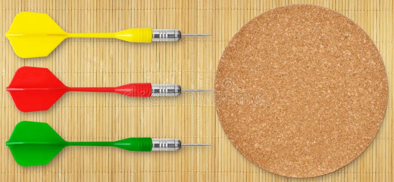 Three Colored Darts and a Cork Circle Stock Photo - Image of target ...