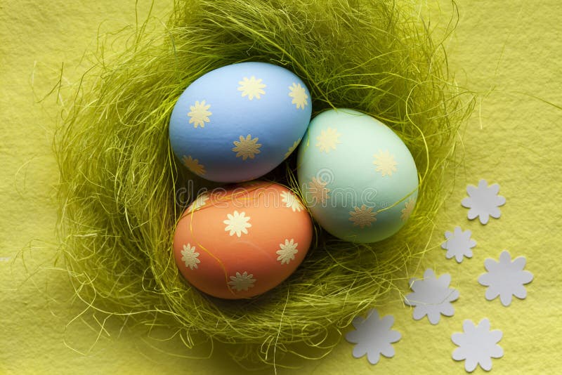 Three Colored Easter Eggs in the Nest Stock Photo - Image of tradition ...
