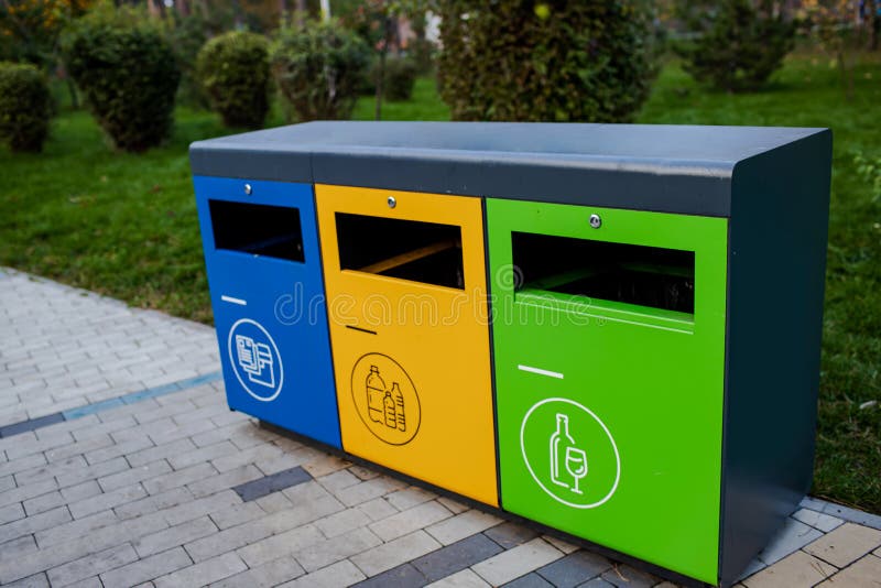 Colored Garbage Cans for Sorting Garbage in City. Stock Image - Image ...