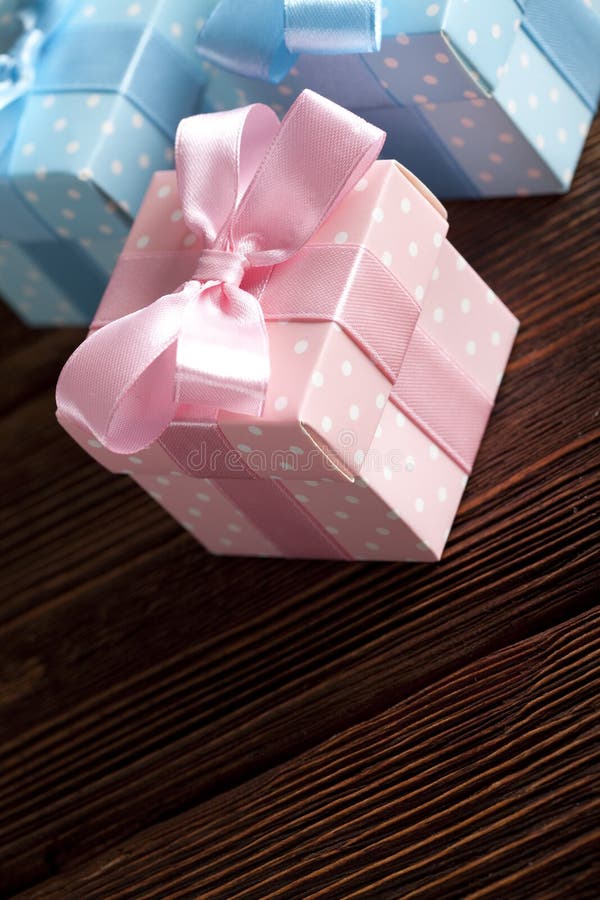 Three Colored Gift Boxes on Wooden Background Stock Photo - Image of ...