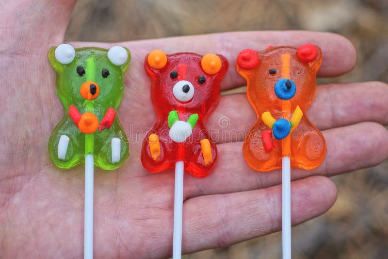 Three Colored Gummies Candies in the Shape of Bears on Sticks Stock ...