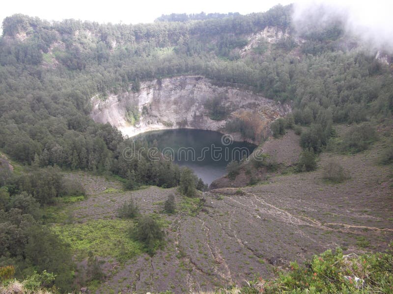 The Three-colored Lake on Mount Kelimutu in the Photo is One of these ...