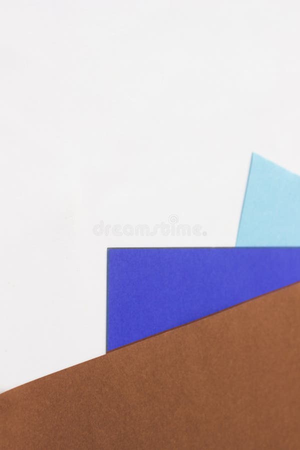 Three Colored Papers with Blue, Violet and Brown Colors on White in the ...