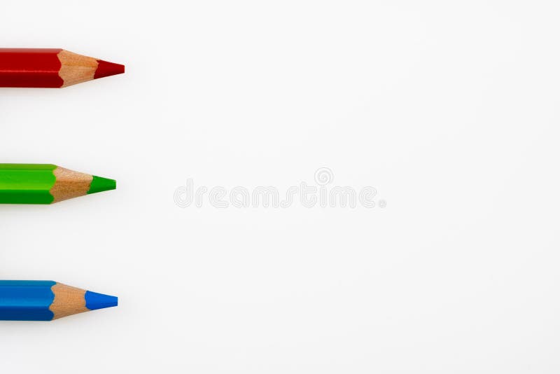 Three colored pencils stock image. Image of orange, backgrounds - 108662631