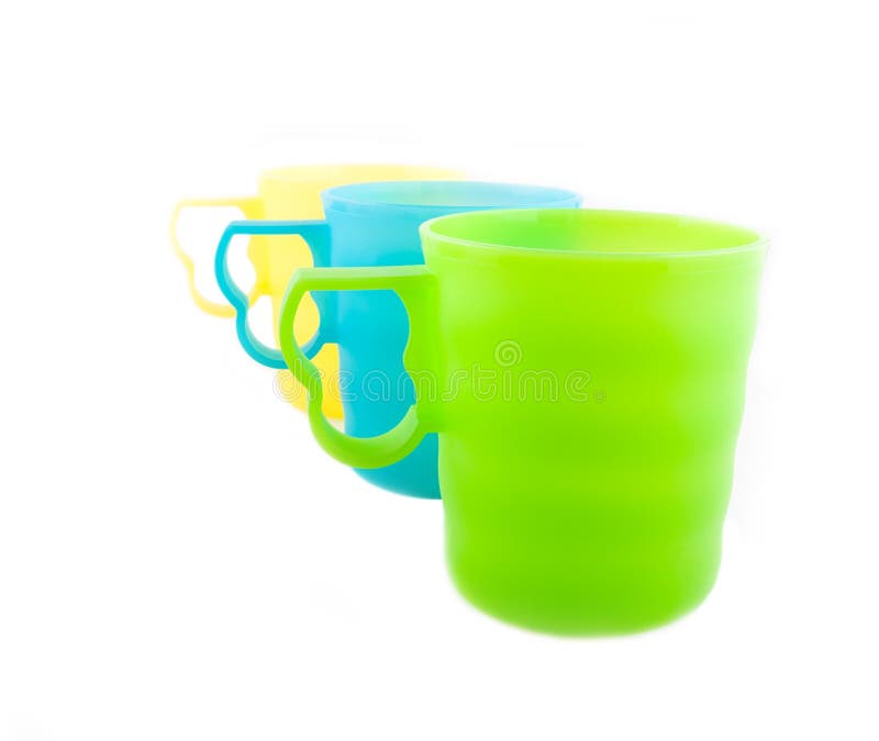 Three colored plastic cups stock photo. Image of three - 13384612