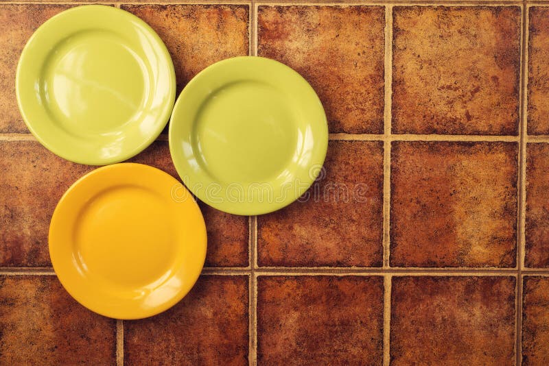 Three colored plates stock photo. Image of blank, kitchen - 72894748