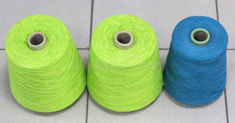 Three Colored Threads Wound on Bobbins in Production Top View Stock ...