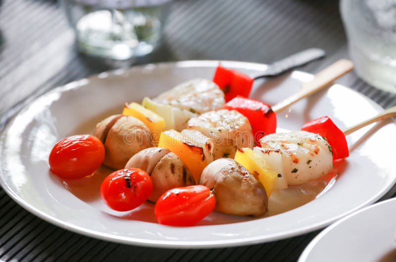 Barbeque Sticks with Meat, on the Grill and Heavy Smoke Above Brazier ...