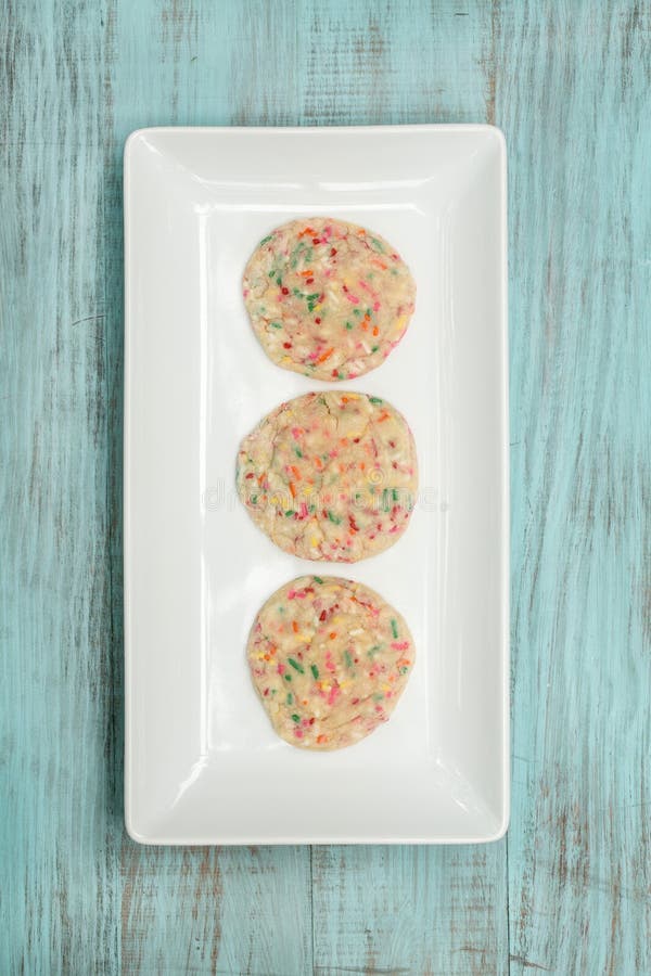 Three Colorful Confetti Cookies on a Plate Stock Image - Image of milk ...