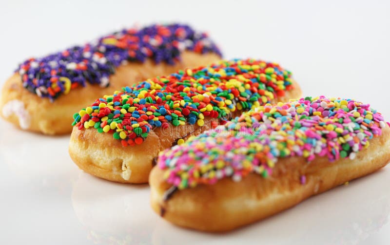 Three Colorful Filled Donuts Stock Photo - Image of fried, bakery: 3432532