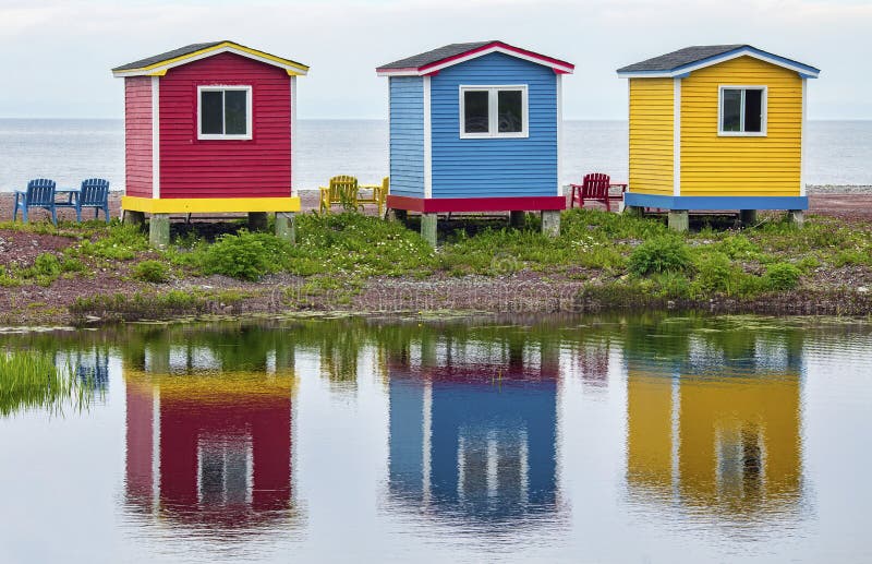 Three colorful huts editorial photo. Image of calm, water - 221174216