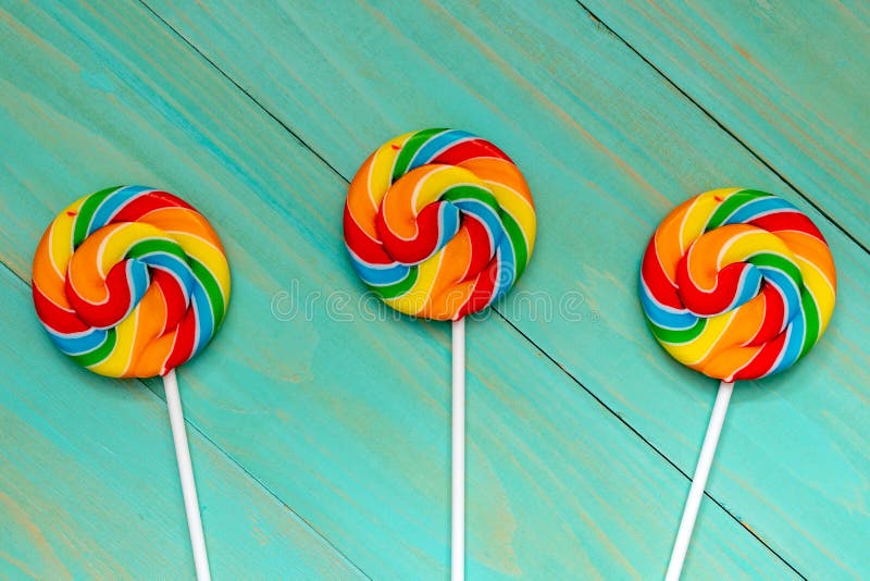 Three Colorful Spiral Lollipops Stock Image - Image of color, candy ... Three Colorful Spiral Lollipops Stock Image - Image of color, candy ...