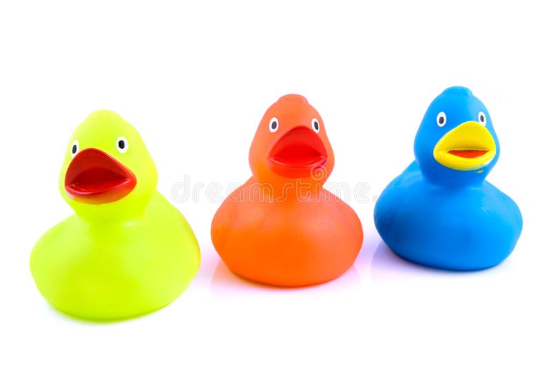 Three Colorful Rubber Ducks Stock Photo - Image of background, play ...
