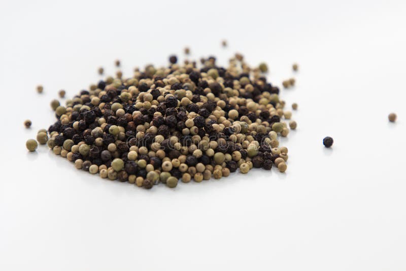 Three Colors Pepper Scattered on White Table Stock Photo - Image of ...