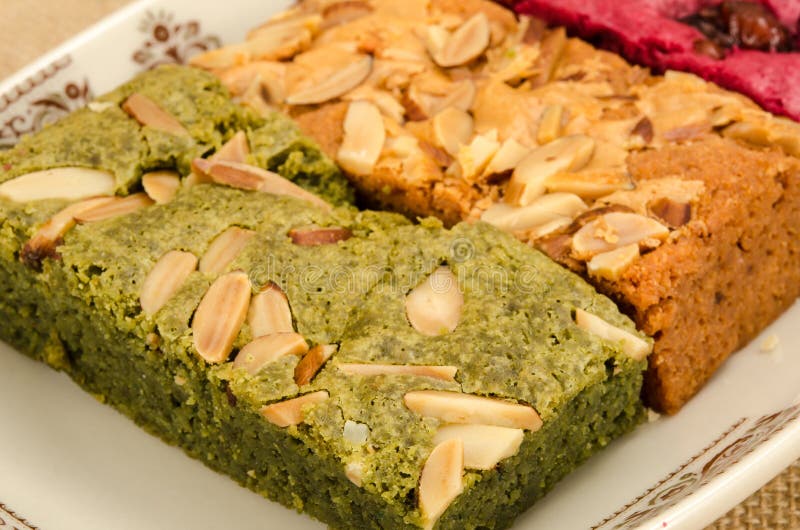 Three colour cakes stock photo. Image of baked, icing - 48215800