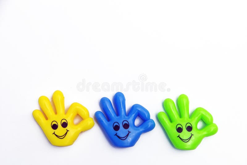 Three Colour Small Plastic Hands with Smile on Face Making the OK Sign ...
