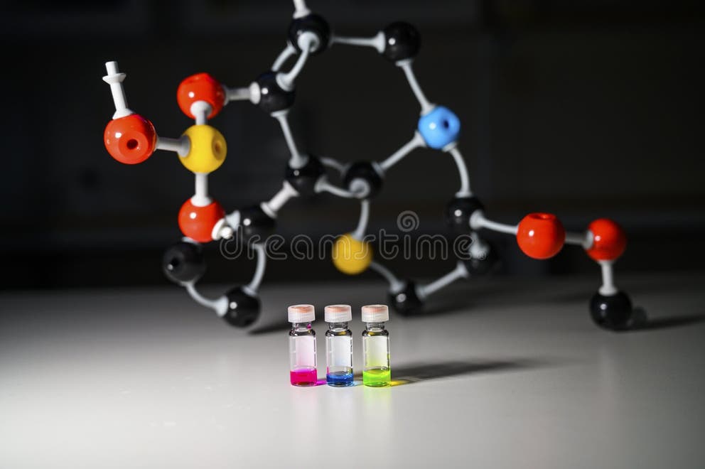 Three Colourful Solution in Different LCMS Glass Vial on a White Bench ...