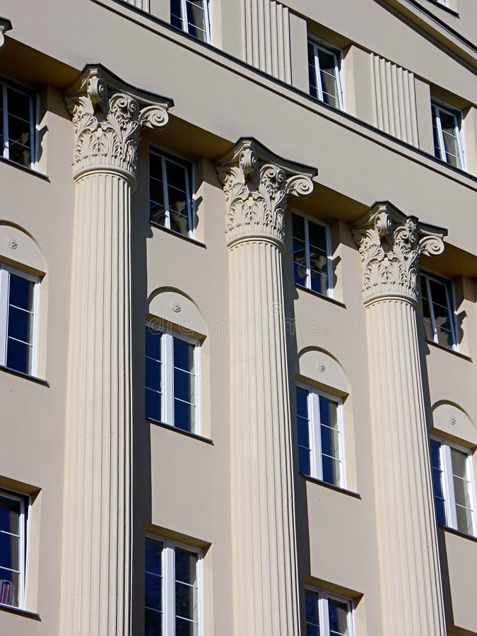 Three columns stock image. Image of corinthian, leaves - 310395