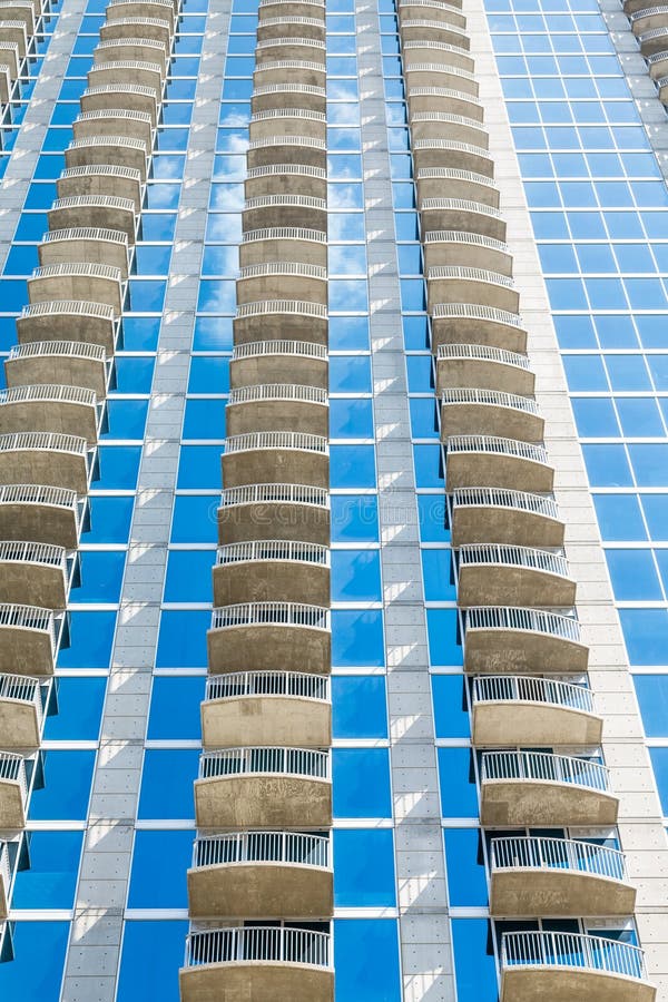 Three Columns of Balconies stock image. Image of condominium - 57129317