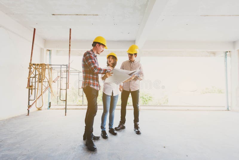Three construction workers stock image. Image of building - 946233