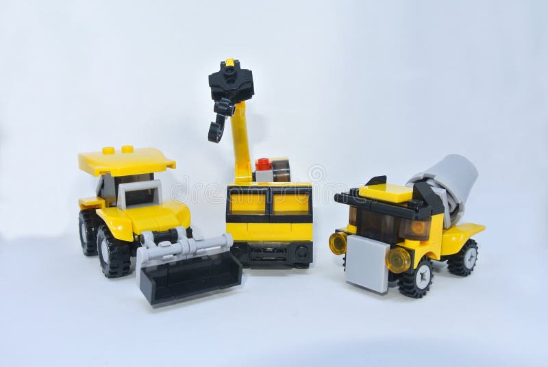 Three Construction Heavy Machine Toys Made from Plastic Blocks Stock ...
