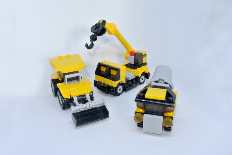 Three Construction Heavy Machine Toys Made from Plastic Blocks Stock ...