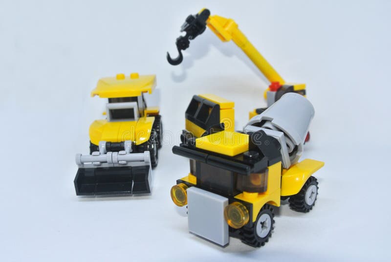 Three Construction Heavy Machine Toys Made from Plastic Blocks Stock ...