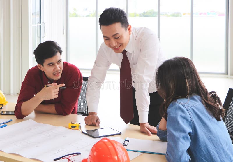 Construction Workers , a Female Architect and Two Male Engineers ...