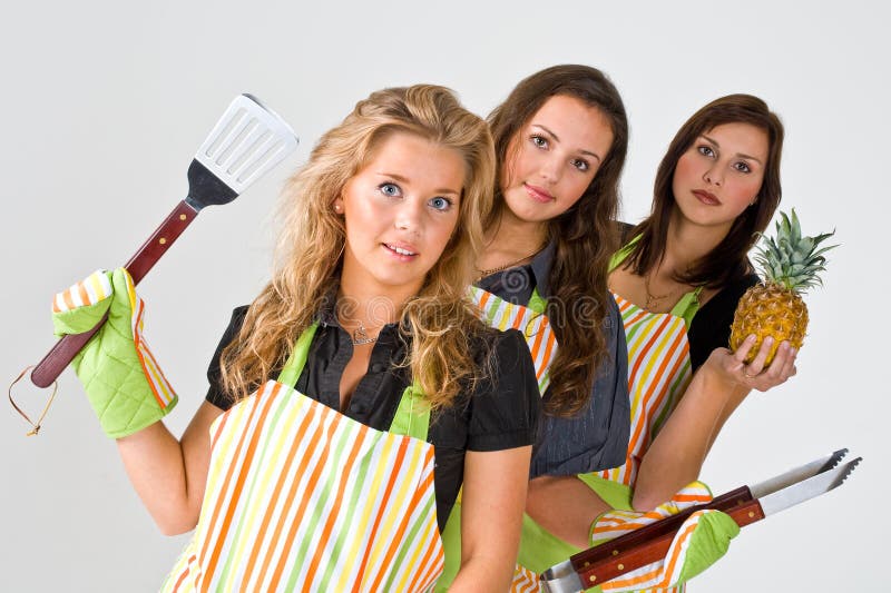 Three girls cooking stock image. Image of pose, happy - 4931323