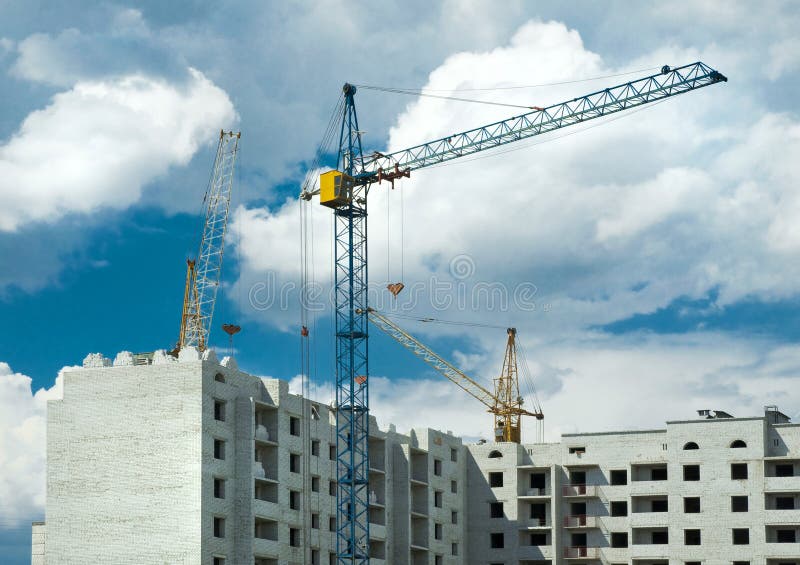 Three Cranes Building a House Stock Photo - Image of development, city ...