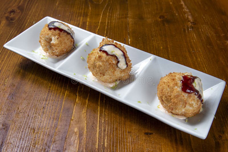Three Crispy, Golden Japanese Fish Balls Stock Image - Image of ...