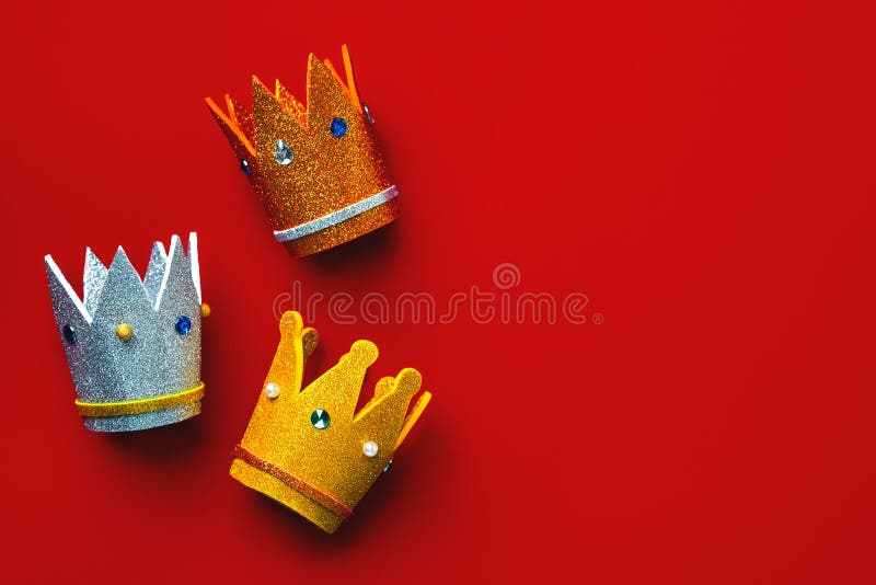 Three Crowns on a Table with Lights Behind Them Stock Photo - Image of ...