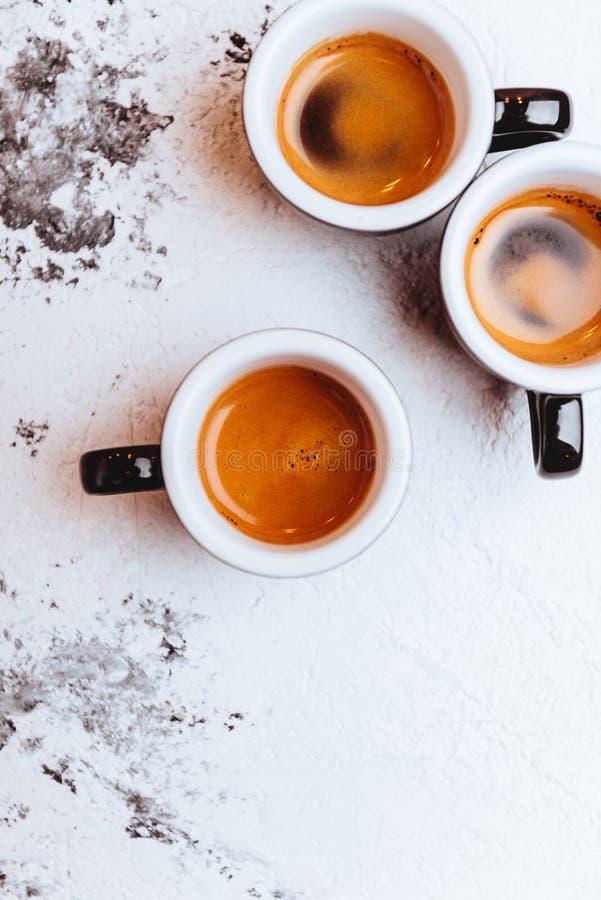 Three Cups of Freshly Brewed Espresso Coffee Stock Image - Image of ...