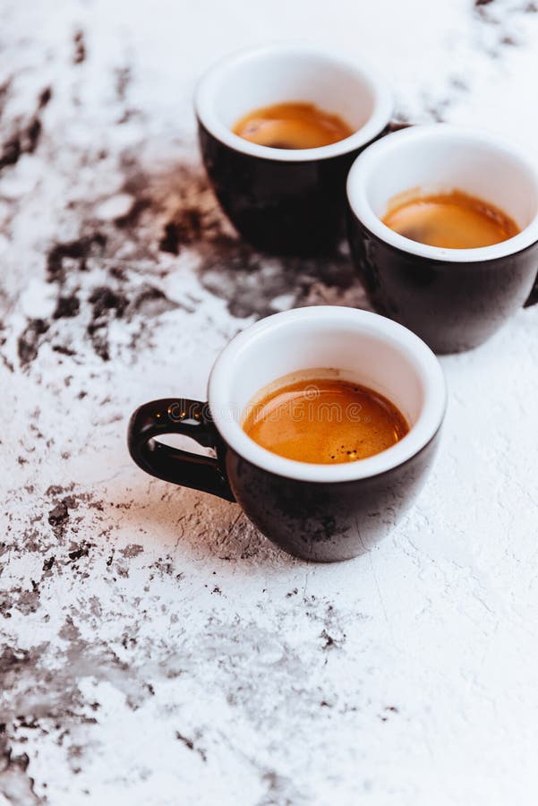 Three Cups of Freshly Brewed Espresso Coffee Stock Image - Image of ...