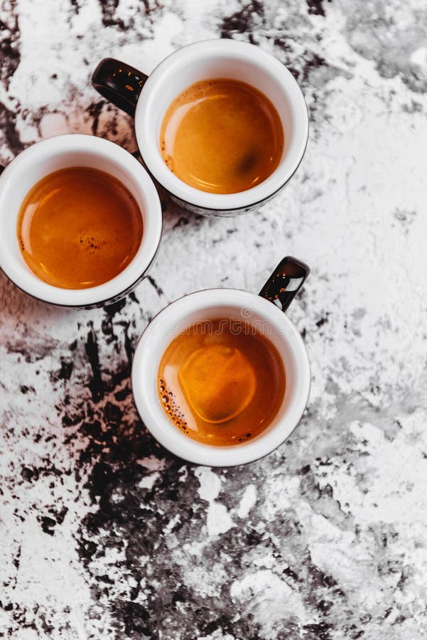Three Cups of Freshly Brewed Espresso Coffee Stock Image - Image of ...