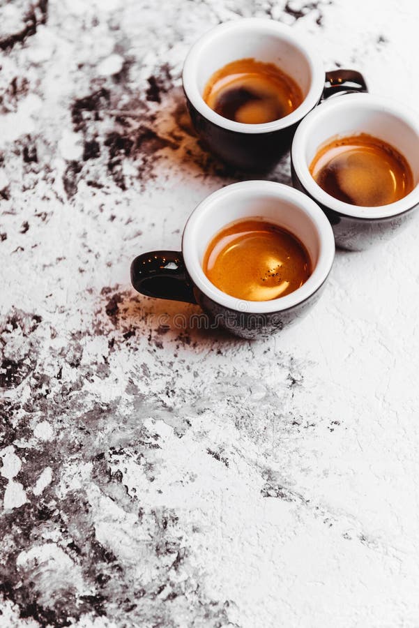 Three Cups of Freshly Brewed Espresso Coffee Stock Image - Image of ...
