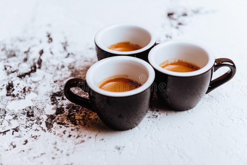 Three Cups of Freshly Brewed Espresso Coffee Stock Image - Image of ...