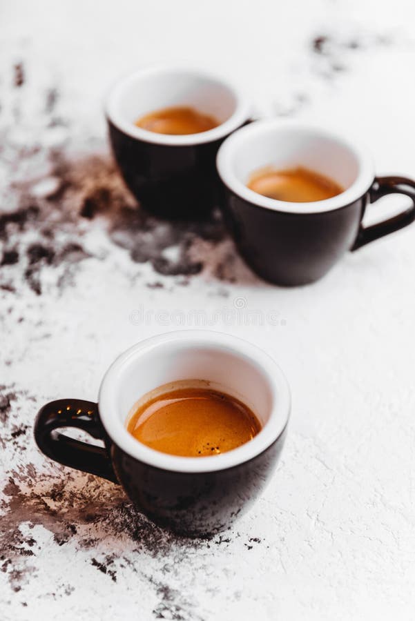 Three Cups of Freshly Brewed Espresso Coffee Stock Image - Image of ...