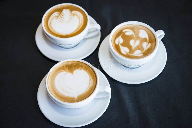 Three Cups of Hot Cappucino Coffees Stock Image - Image of cappuccino ...